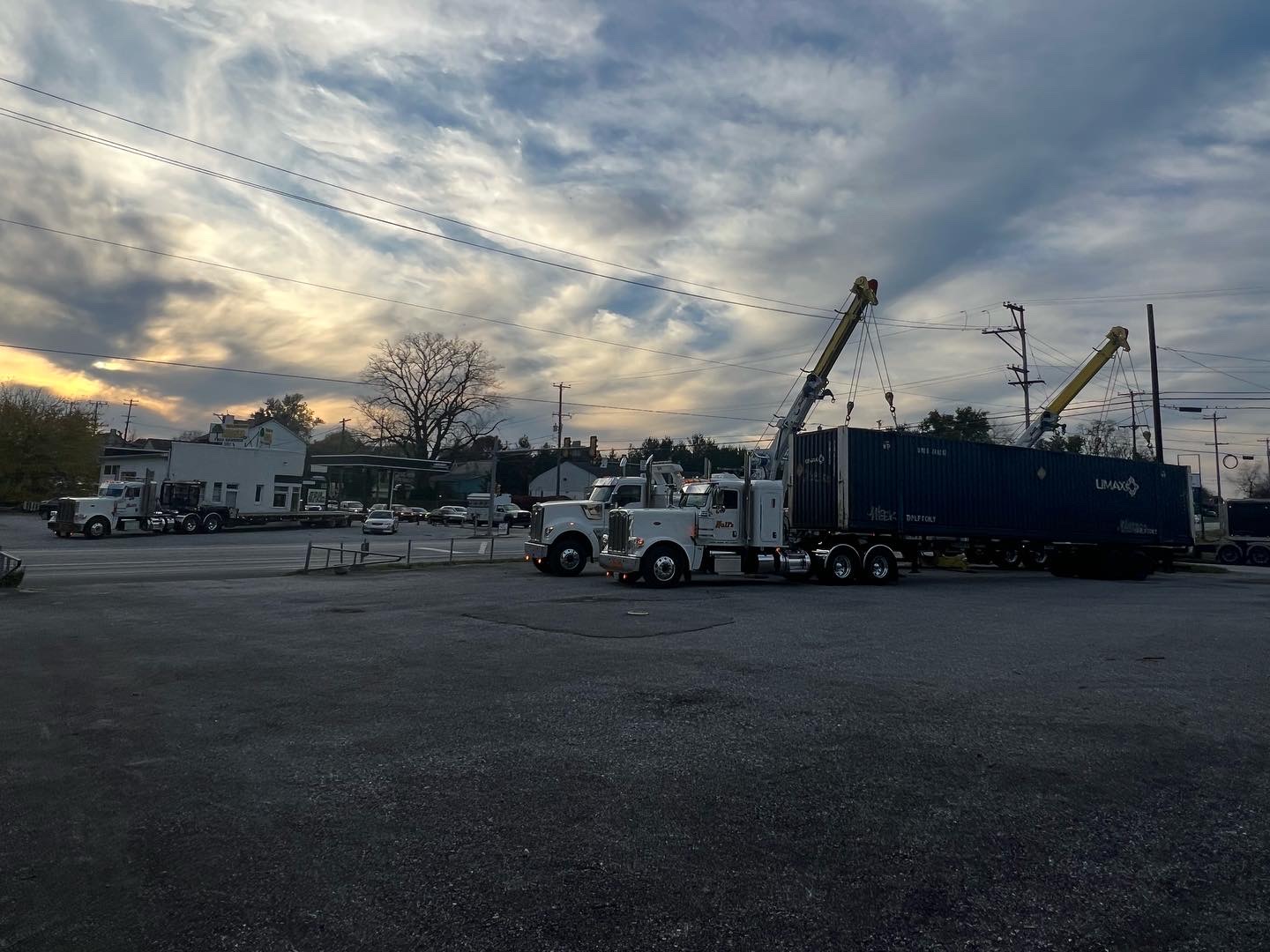 Chassis swap on loaded sea container. – Null's Towing